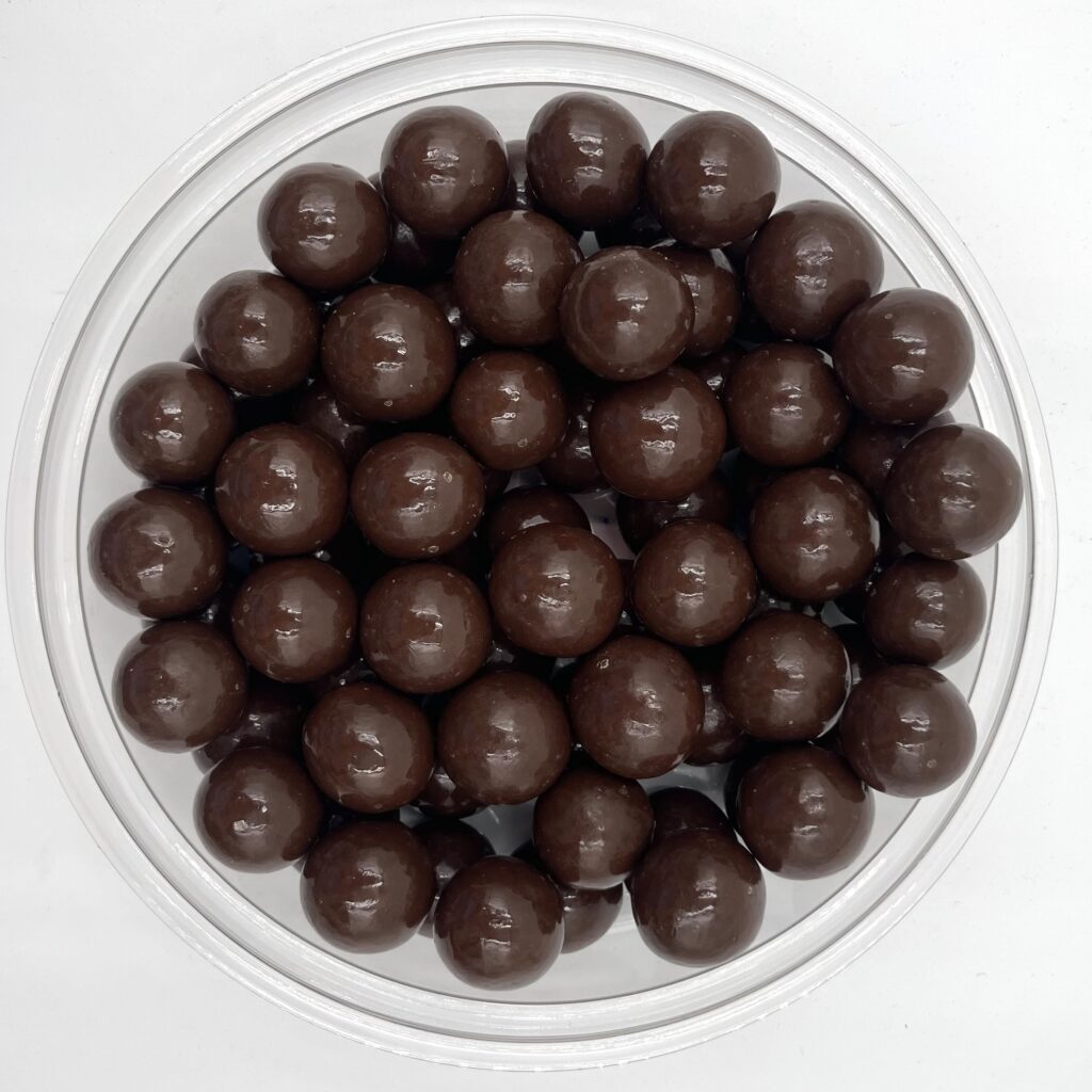Milk Chocolate Malt Balls (18 oz container) - The Nutman Company USA, Inc.
